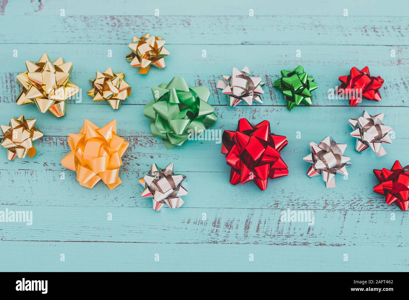 group of star ribbons to decorate wrapped present in CHristmas themed ...