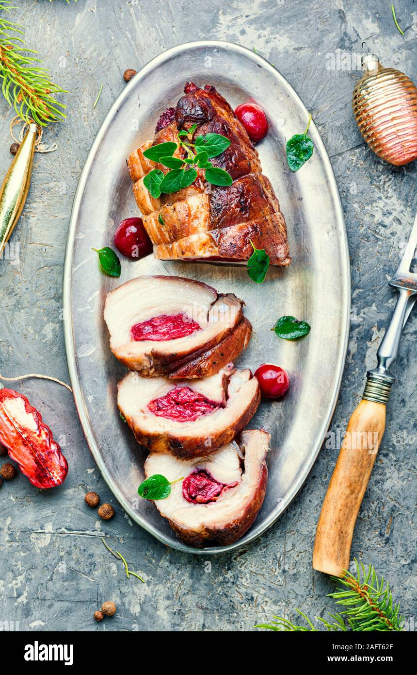 Sliced meatloaf filled with cherries.Christmas dish, festive food Stock ...