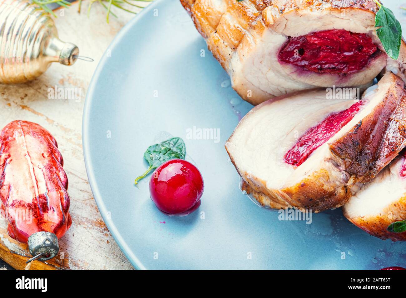 Sliced meatloaf filled with cherries.Christmas dish, festive food Stock ...
