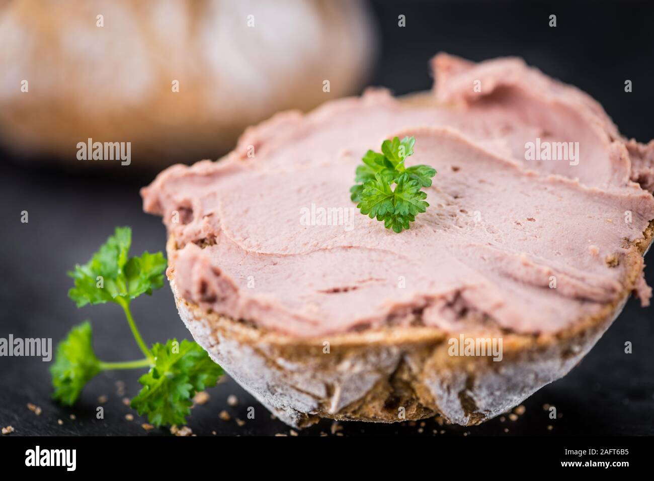 Liverwurst Sandwich on a vintage background as detailed close-up shot ...