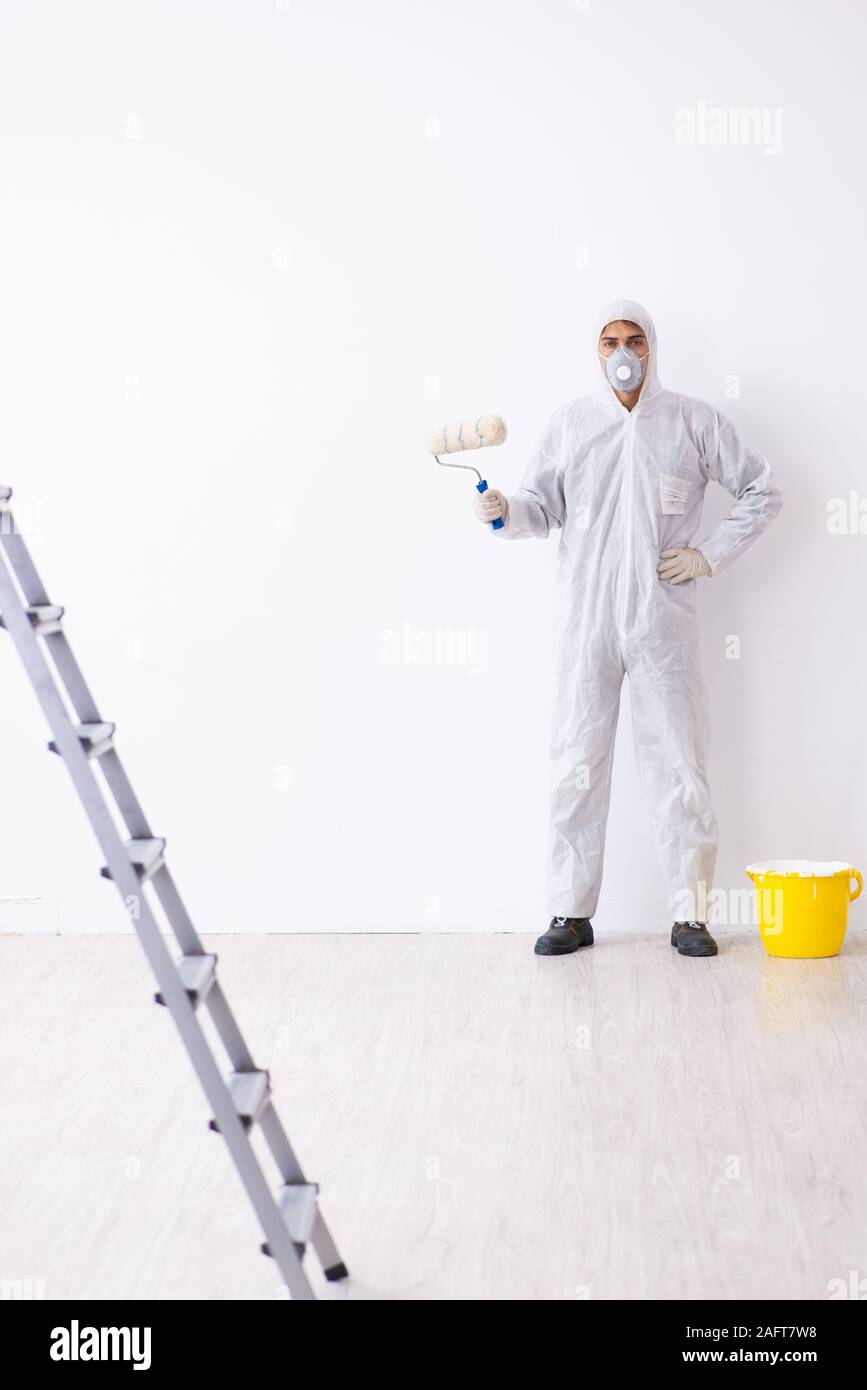 Painter working at the construction site Stock Photo - Alamy