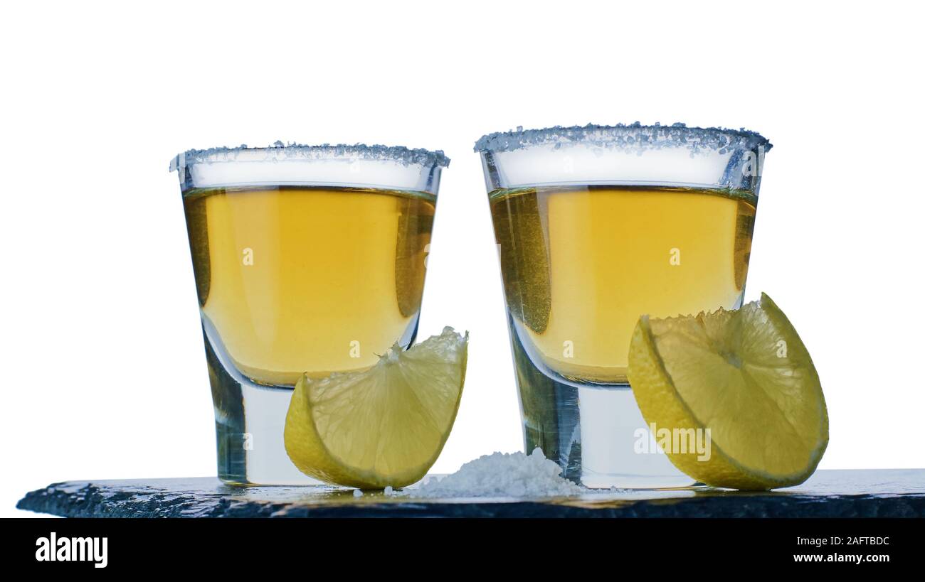 alcoholic drink with lemon and salt on a white background Stock Photo ...