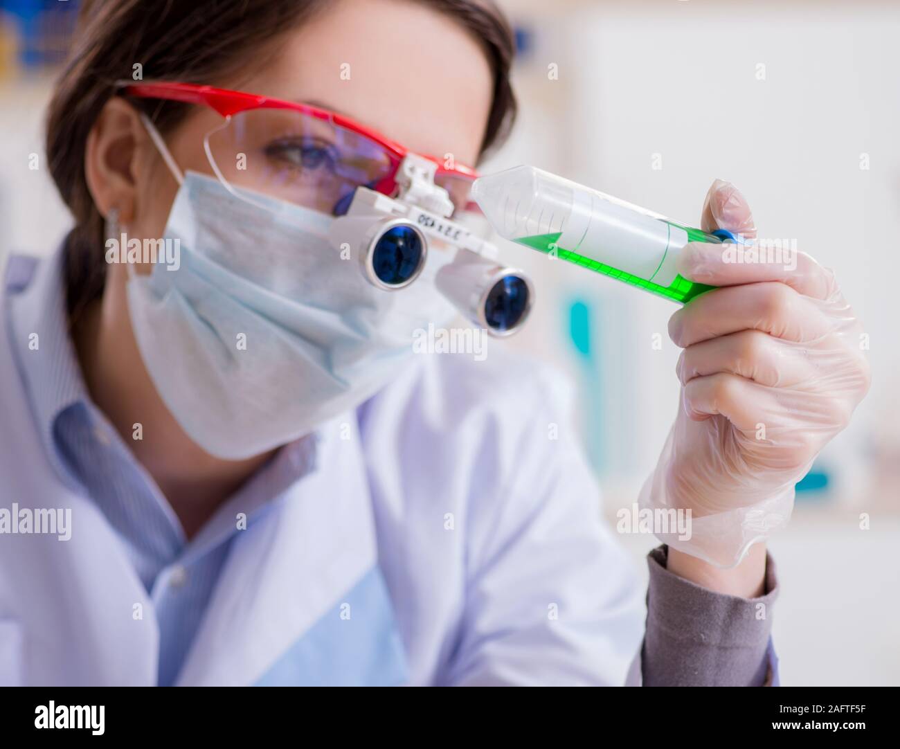 The lab assistant in drug synthesis concept Stock Photo - Alamy