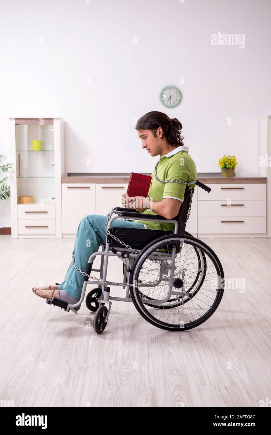 Restrained wheelchair hi-res stock photography and images - Alamy