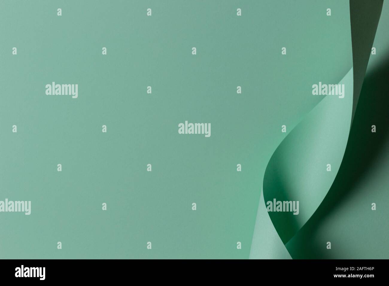 Abstract geometric shape green color paper background Stock Photo - Alamy