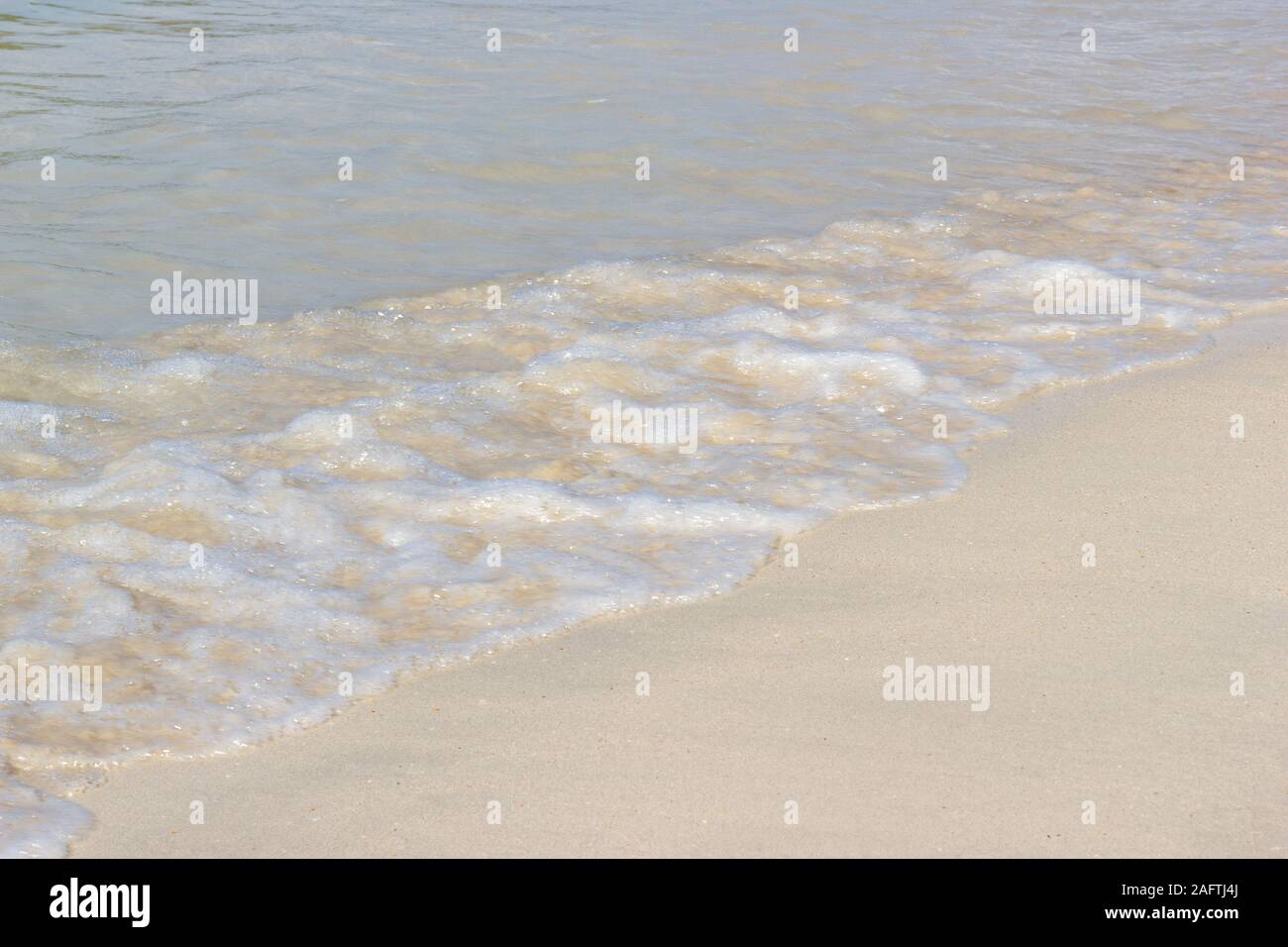 Close up detail of the sea waves washing ashore at the beach Asia ...