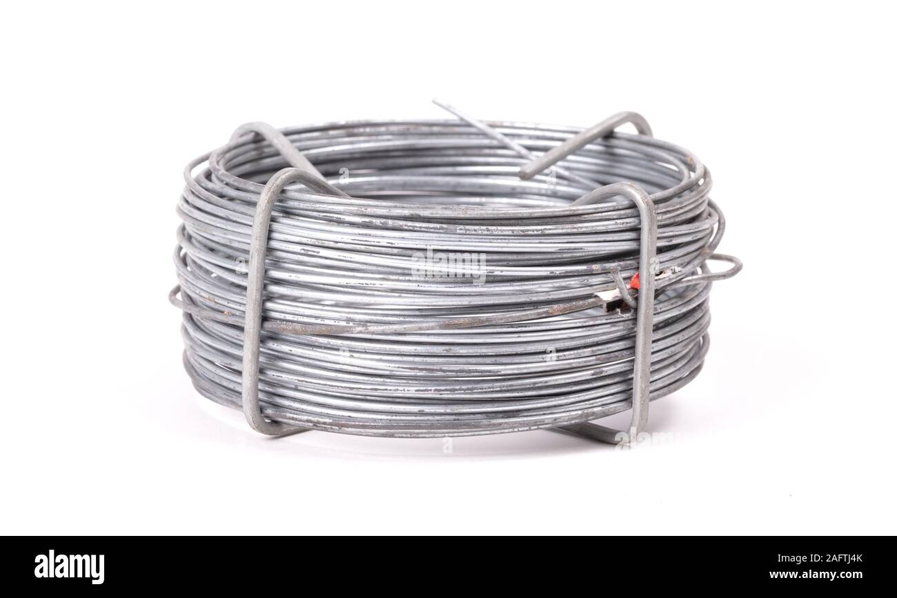 Roll of metal wire, vintage, isolated on white Stock Photo - Alamy