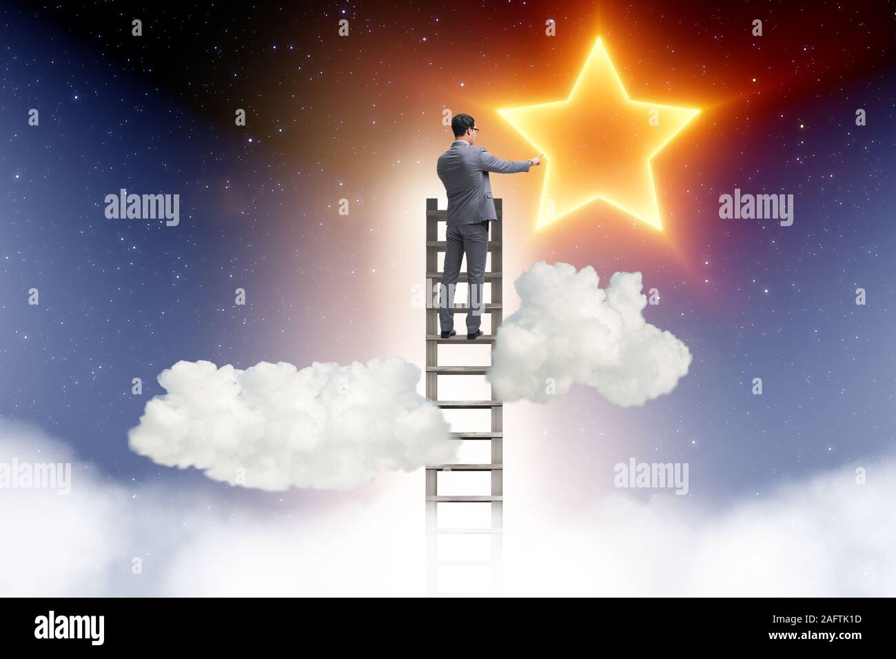 The businessman reaching out for stars Stock Photo - Alamy