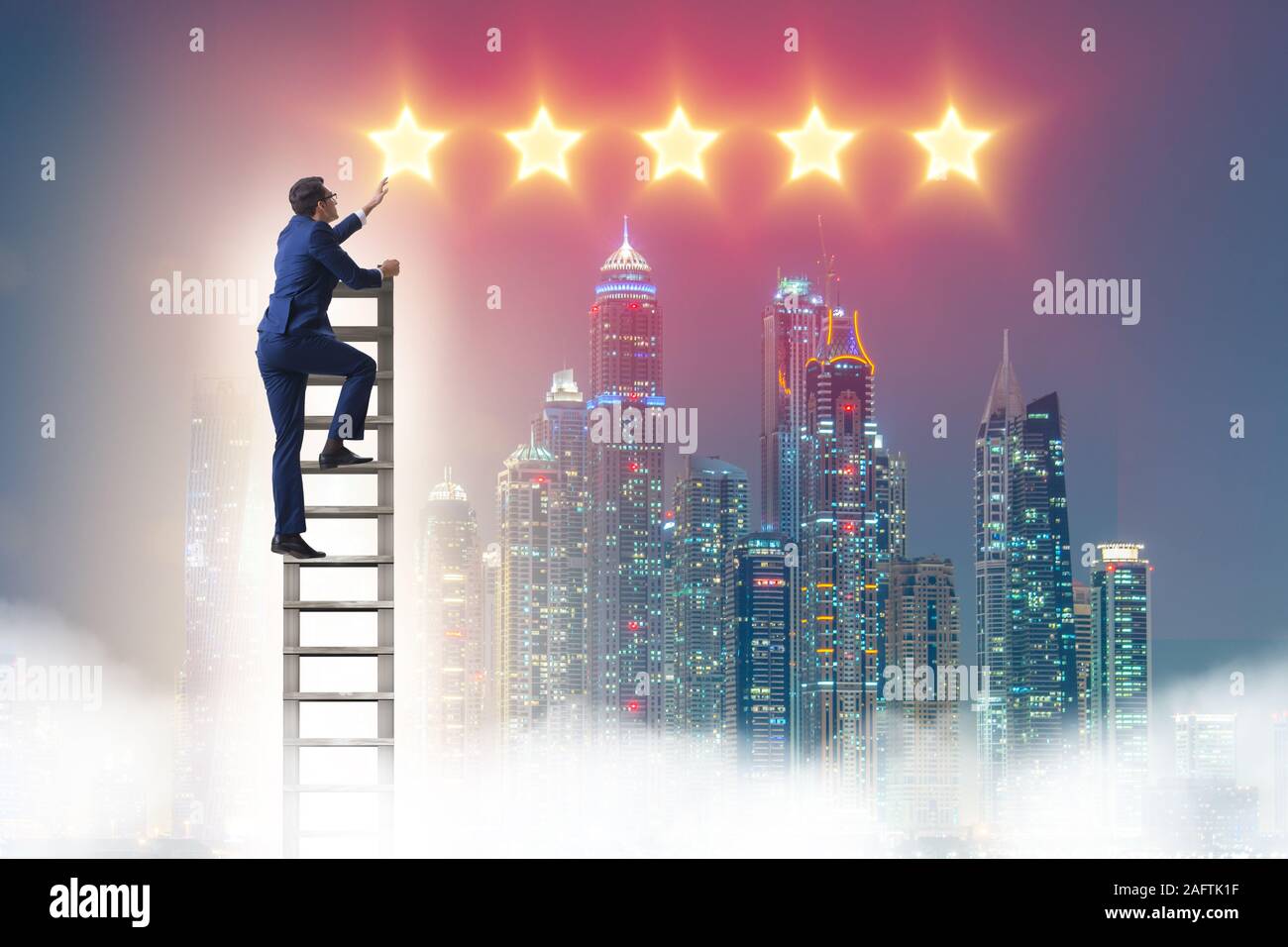 Businessman reaching out for stars hi-res stock photography and images ...