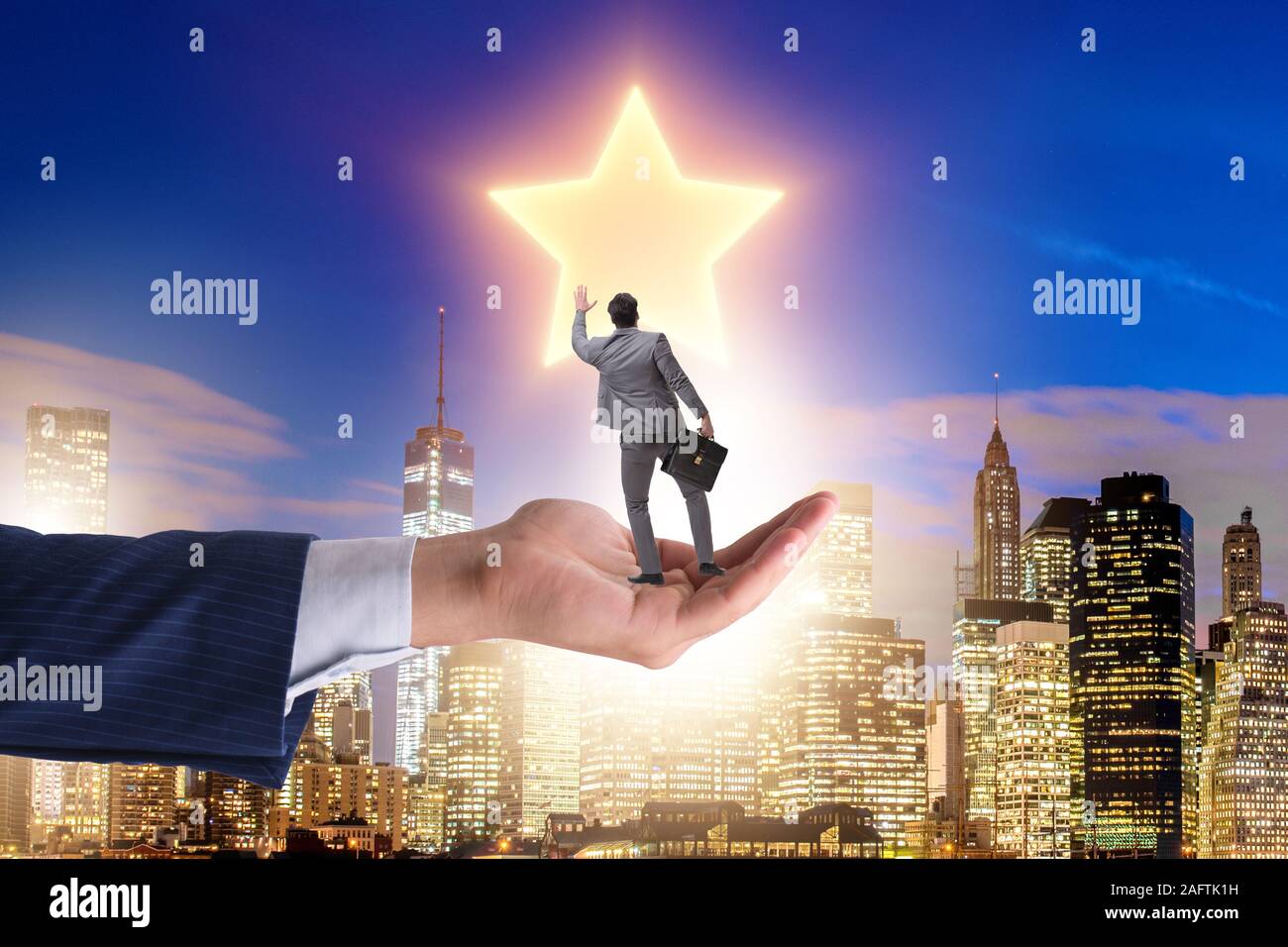 The businessman held on hand reaching out for stars Stock Photo - Alamy