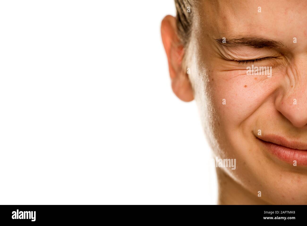 closed female eye on white background Stock Photo - Alamy