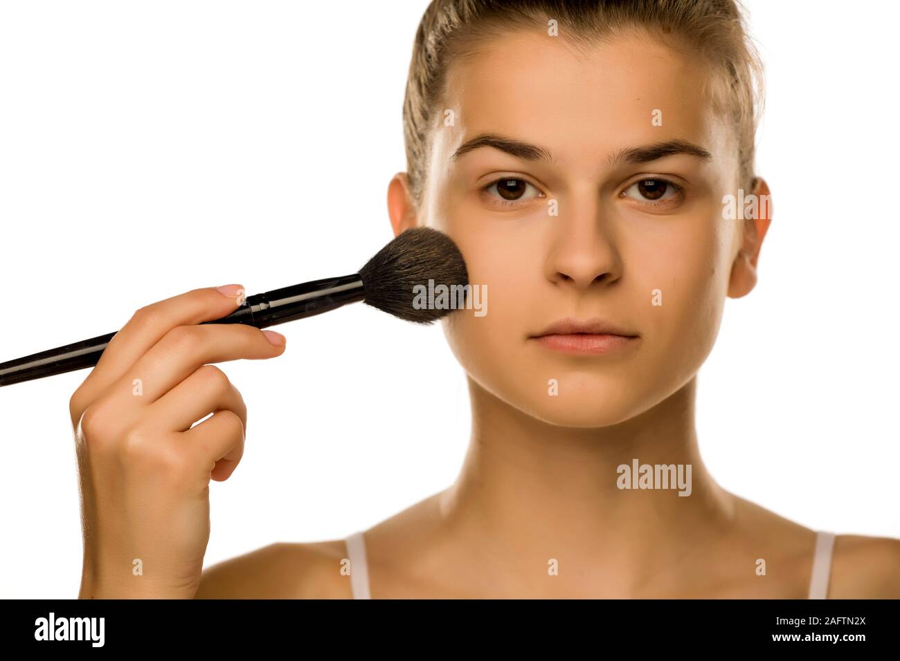 Apply facial powder High Resolution Stock Photography and Images - Alamy