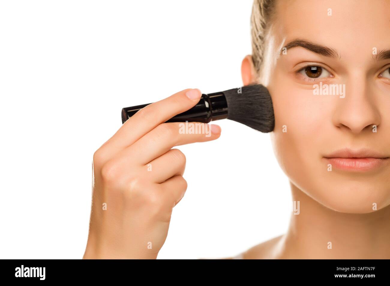 Apply facial powder hi-res stock photography and images - Alamy