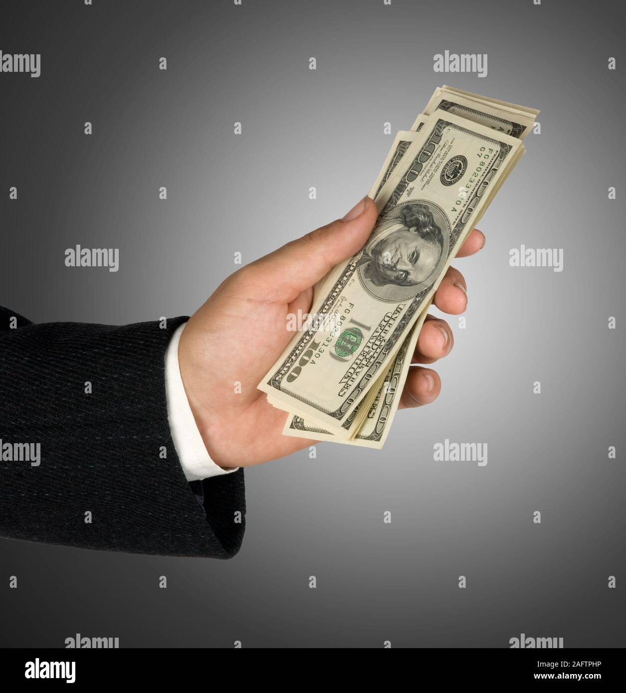 Hand with dollar bills Stock Photo - Alamy