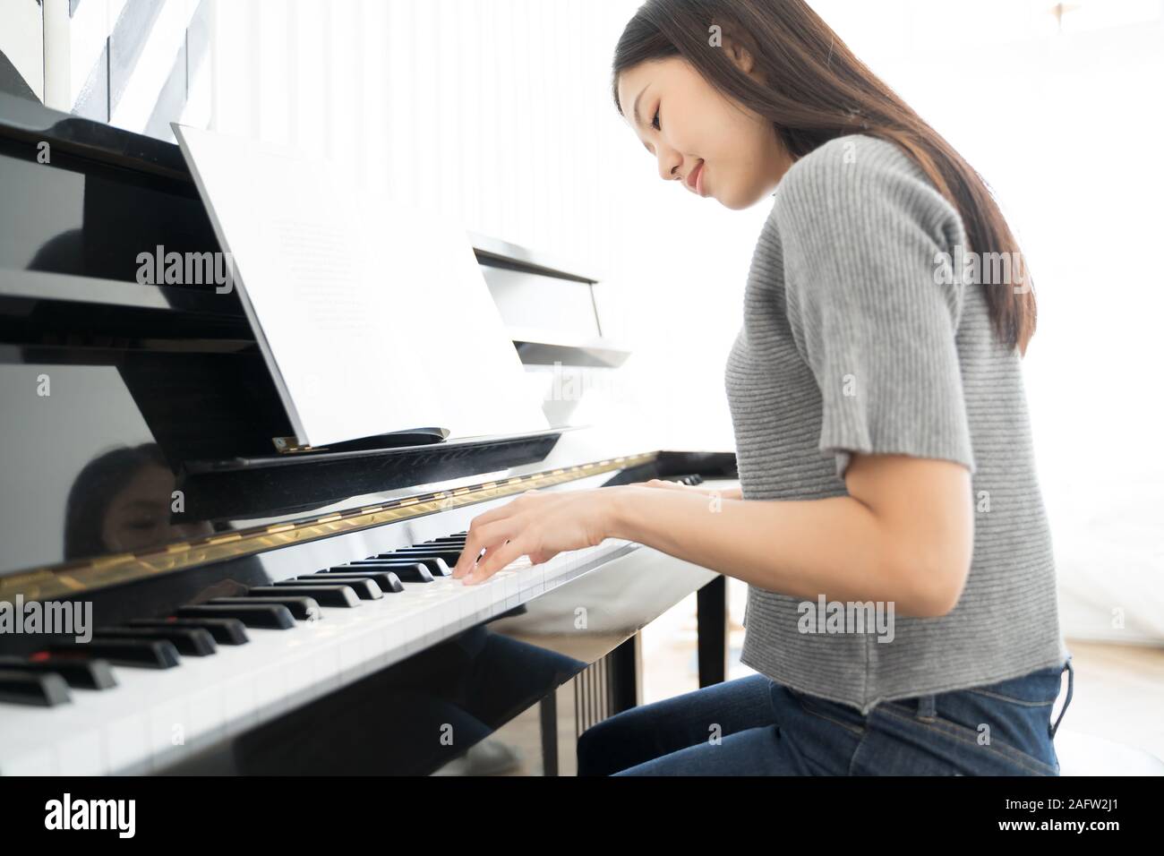 Korean Girl Playing Piano High Resolution Stock Photography and Images ...