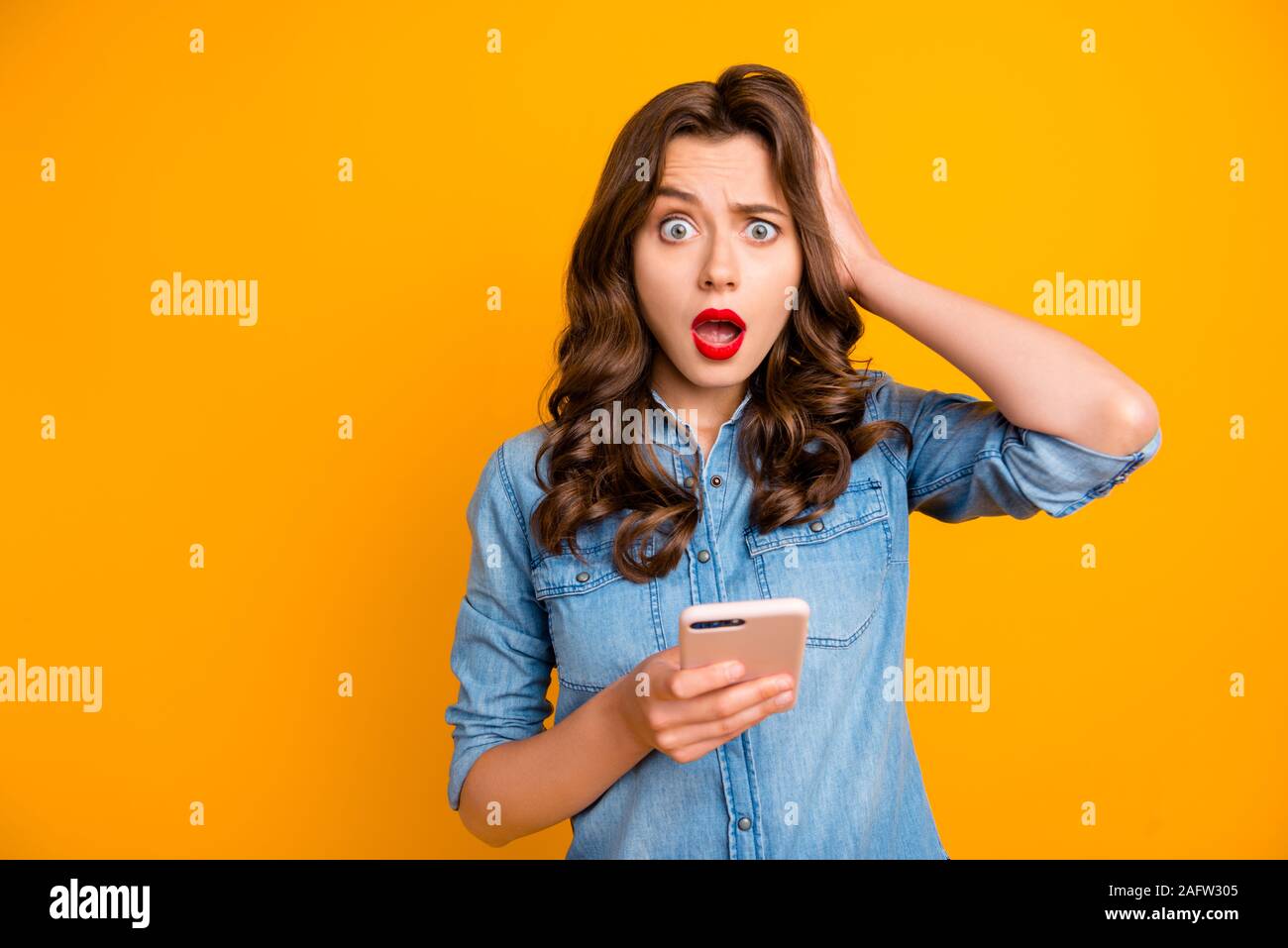 Photo of discontented sad dissatisfied guilty girl wearing denim jeans ...