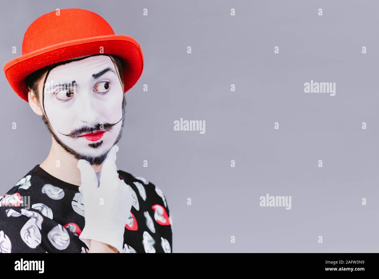 Mime poses and grimaces in the studio Stock Photo - Alamy