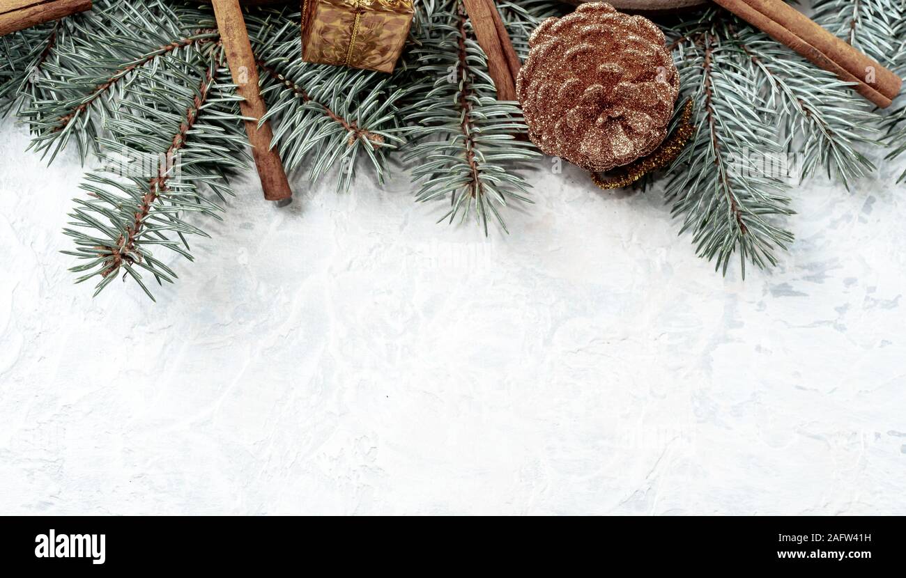 Christmas creative background border, gold color, cones, branches ...