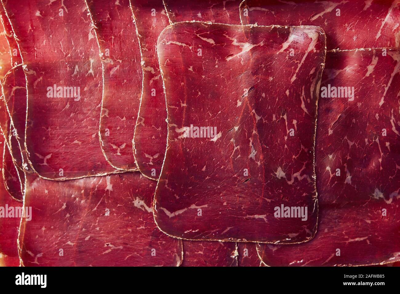 View from above sliced, air-dried Buendnerfleisch meat Stock Photo - Alamy