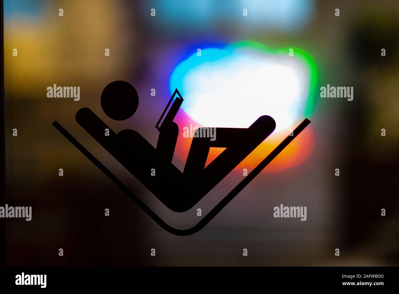 Icon sticker of person reading book Stock Photo - Alamy