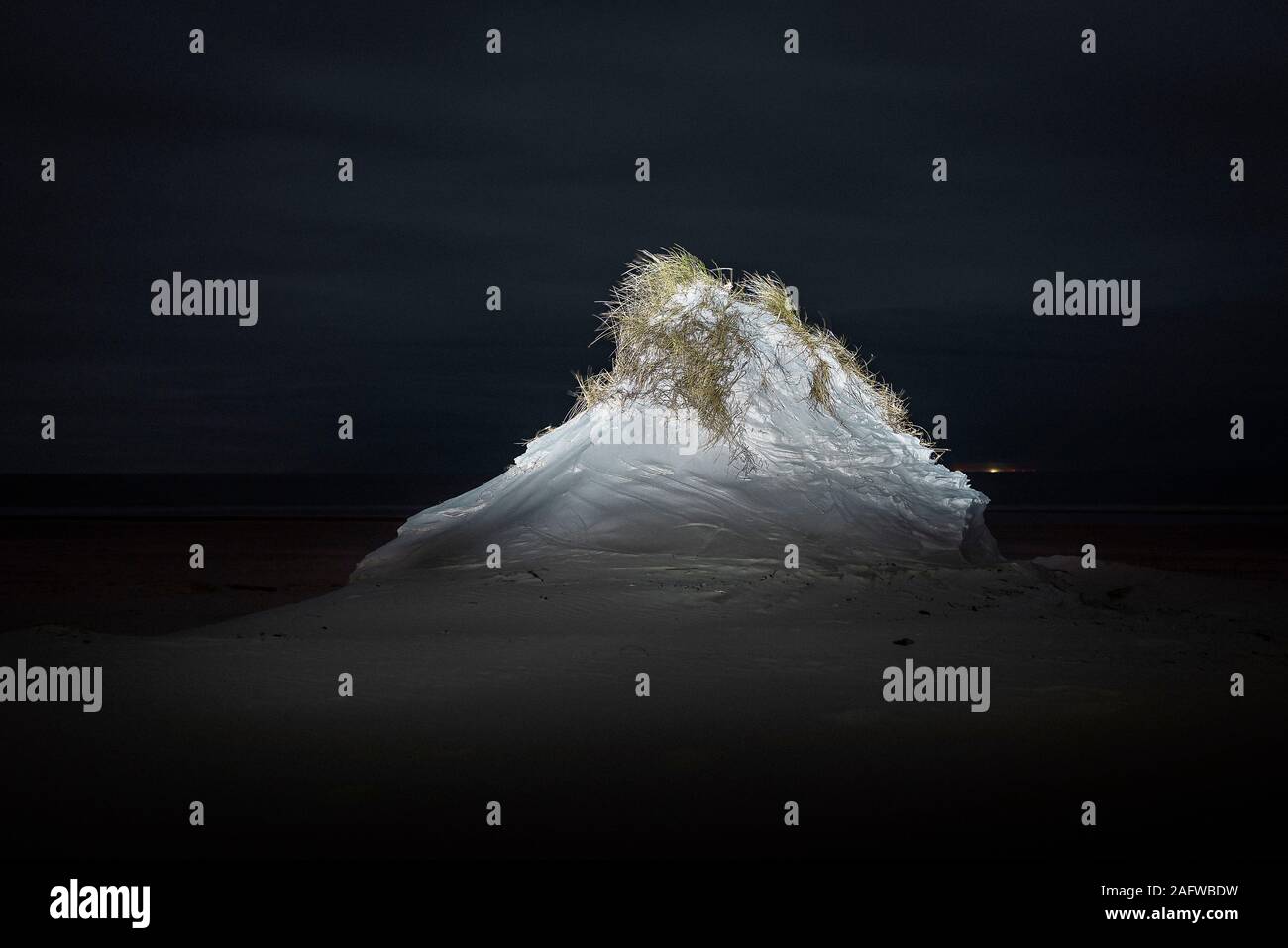 Sand dune illuminated at night Stock Photo - Alamy