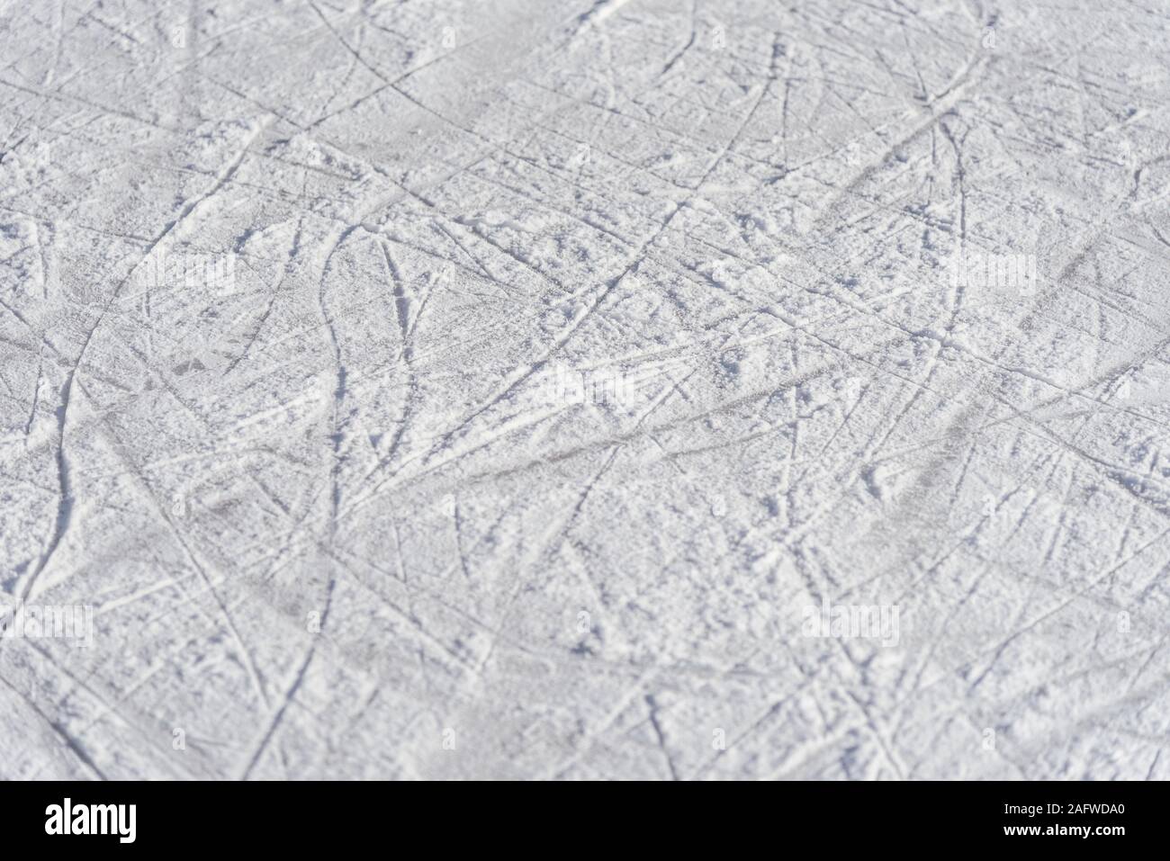 a trace on the ice left by skates on the rink Stock Photo - Alamy