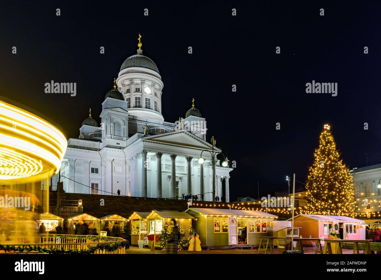 Christmas market on Senate Square in Helsinki, Finland. Cathedral, tree ...