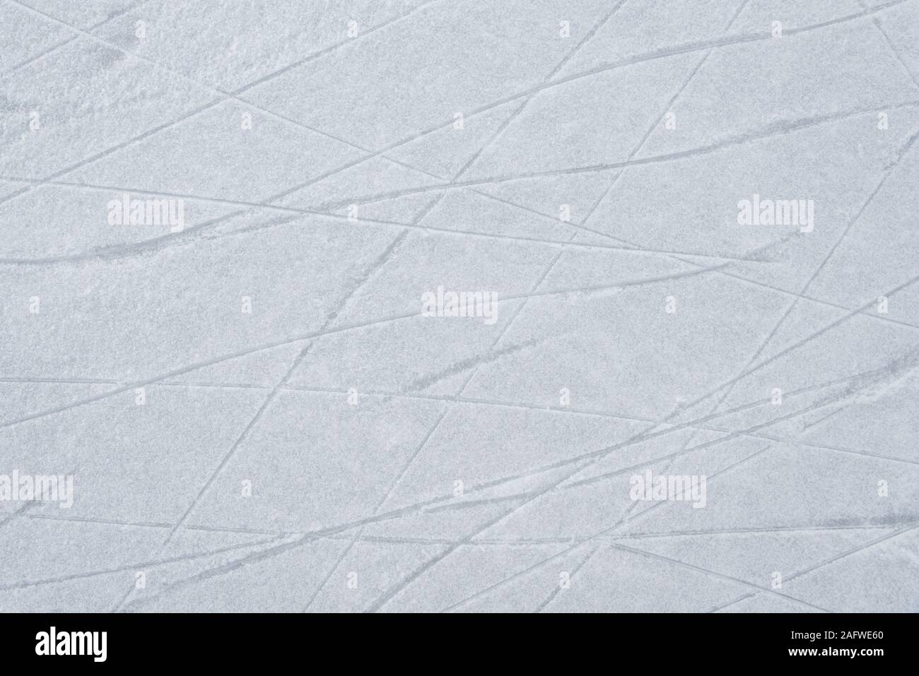 a trace on the ice left by skates on the rink Stock Photo - Alamy