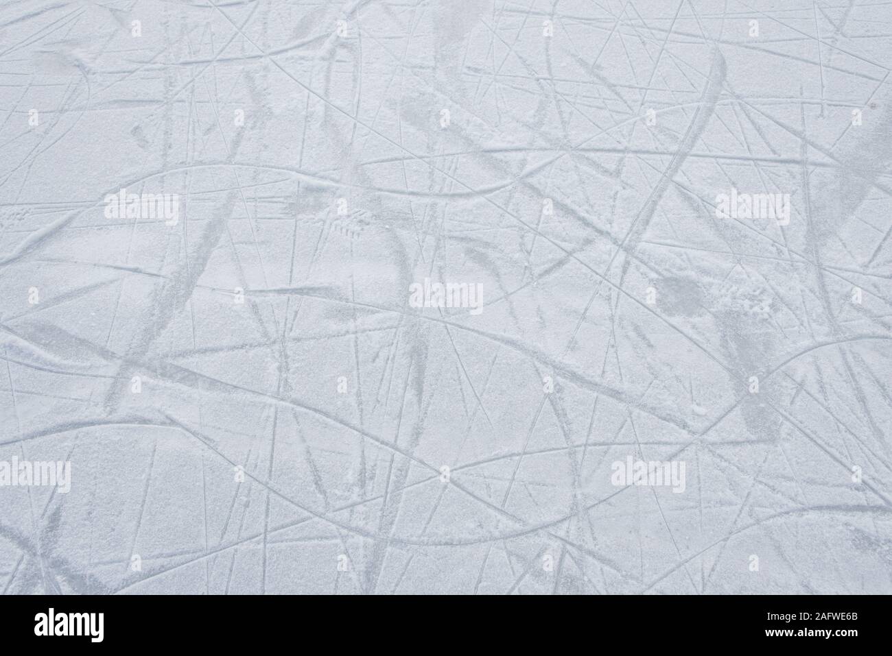 a trace on the ice left by skates on the rink Stock Photo - Alamy