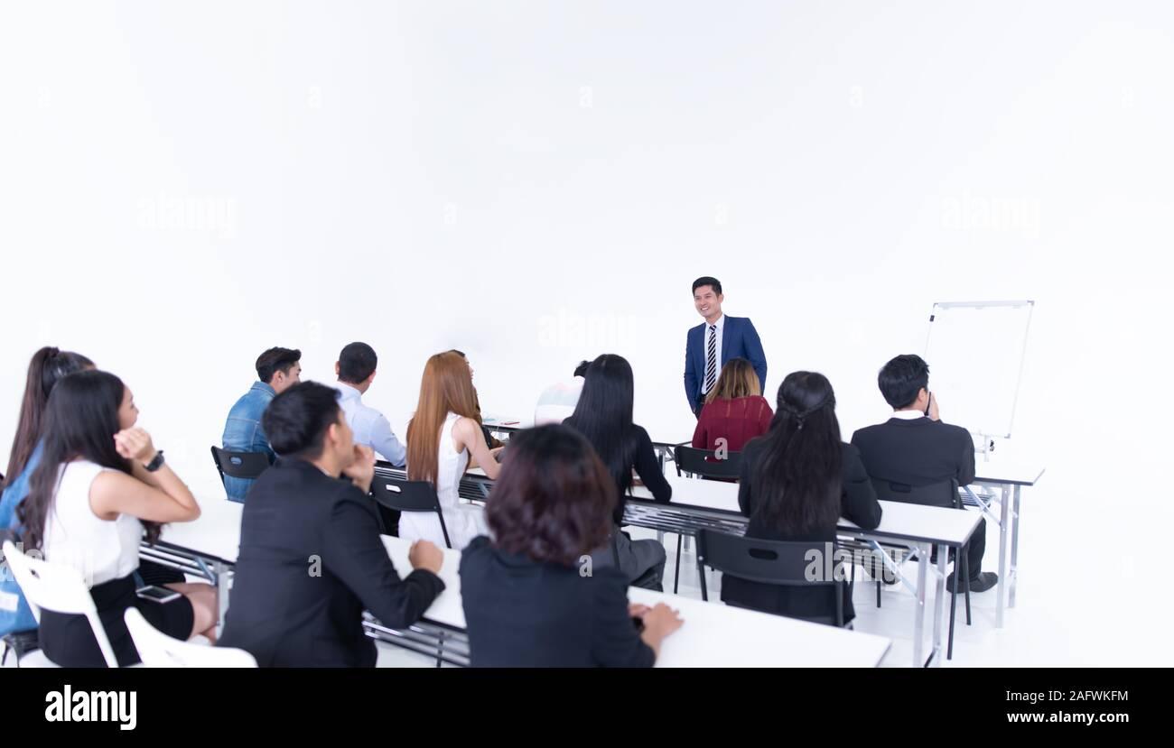 businessman presentation in a conference meeting room and audience of ...