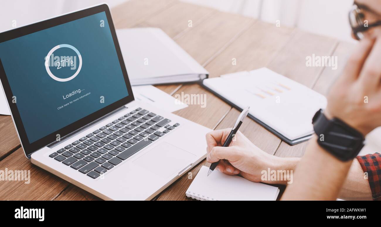 Close up of laptop screen with loading bar Stock Photo - Alamy