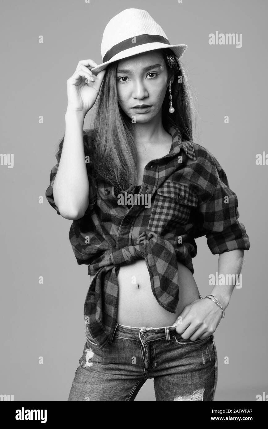 Attractive skinny asian woman black hi-res stock photography and images ...