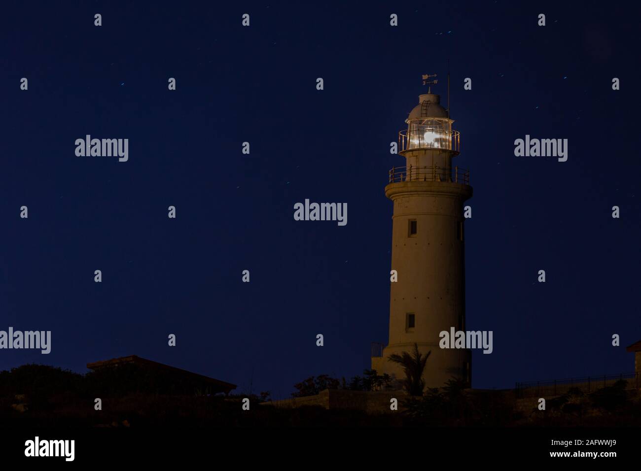 Beautiful lighthouse on a hill captured at night in Cyprus Stock Photo ...