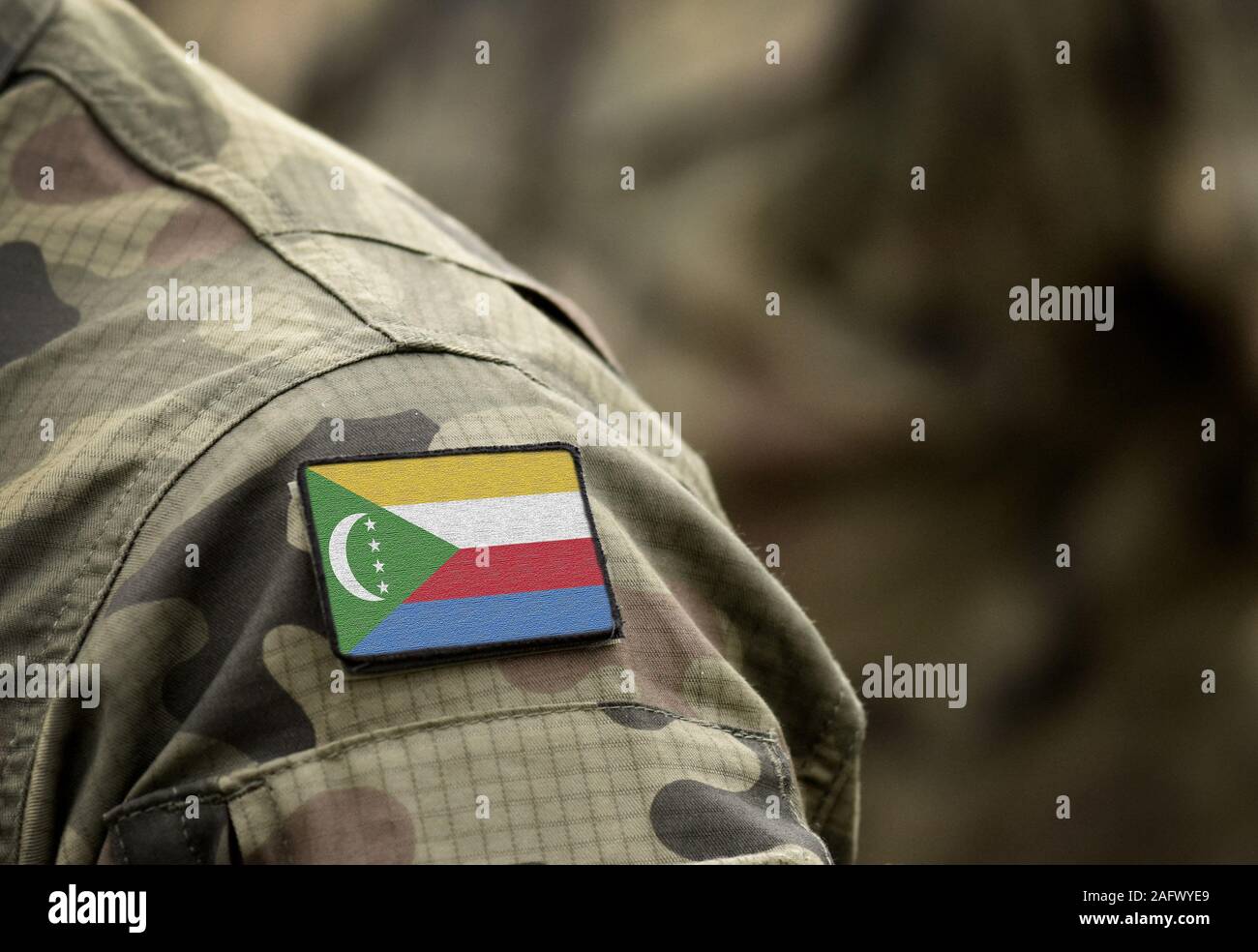 Flag of Comoros on military uniform. Union of the Comoros. Collage ...