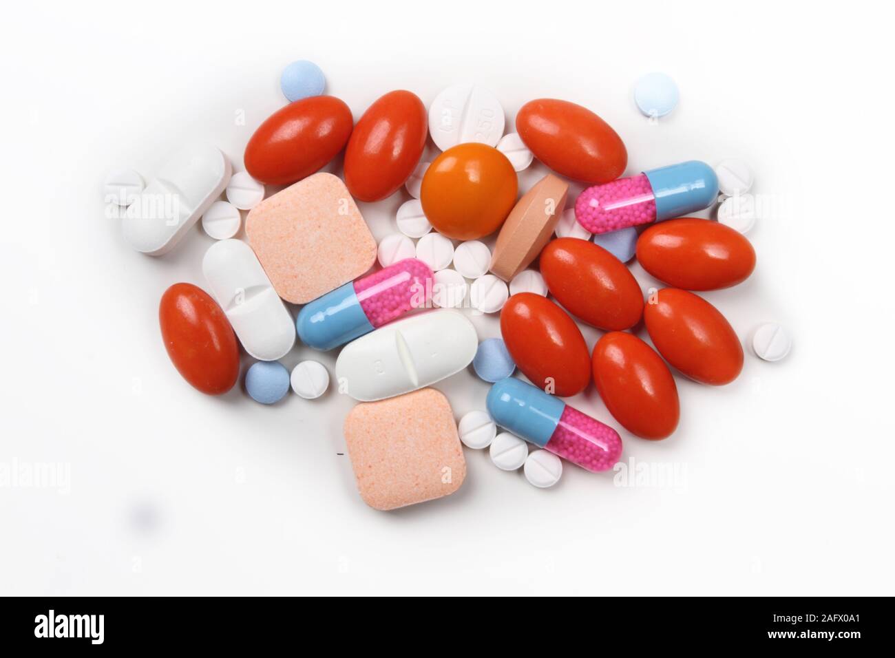 Drugs and medicines - different color pills on white background Stock ...