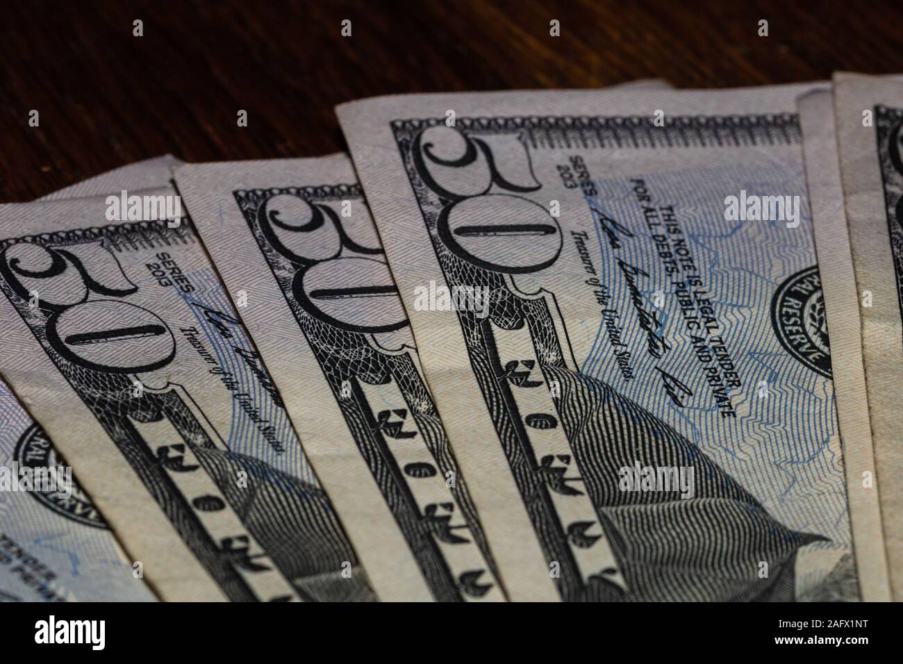 Detail on 50 dollars banknote. Close up of banknote laid out on table ...