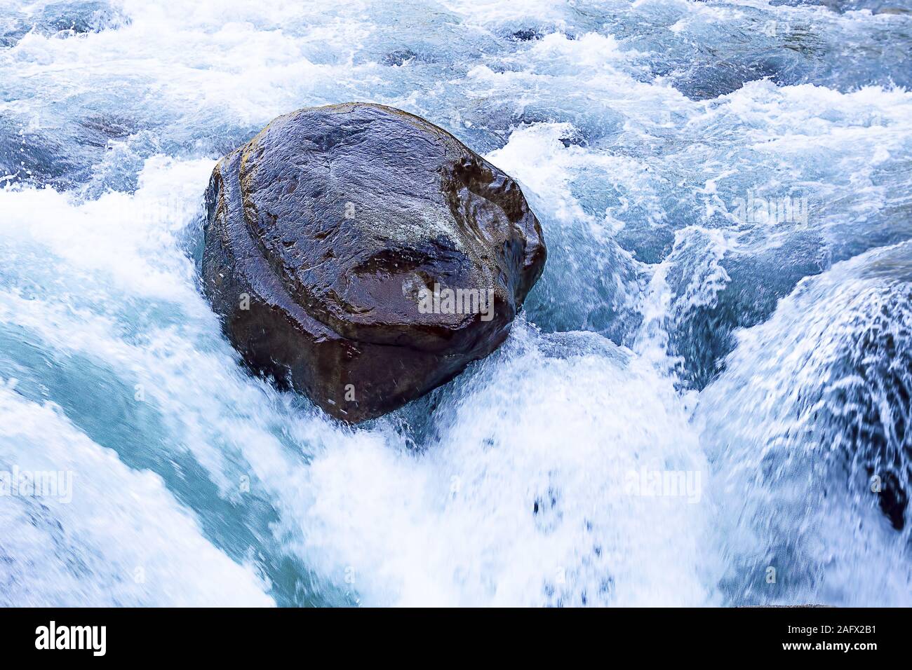 Huge rock formation in a powerful waterfall - great for a cool ...