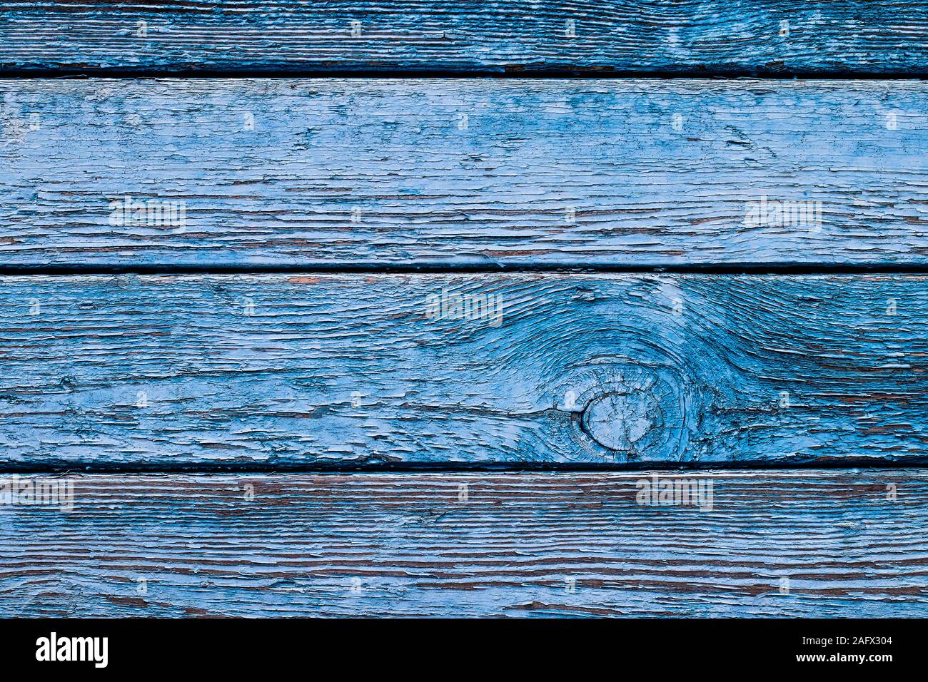 Texture of a blue board with peeling paint. Abstract background for ...