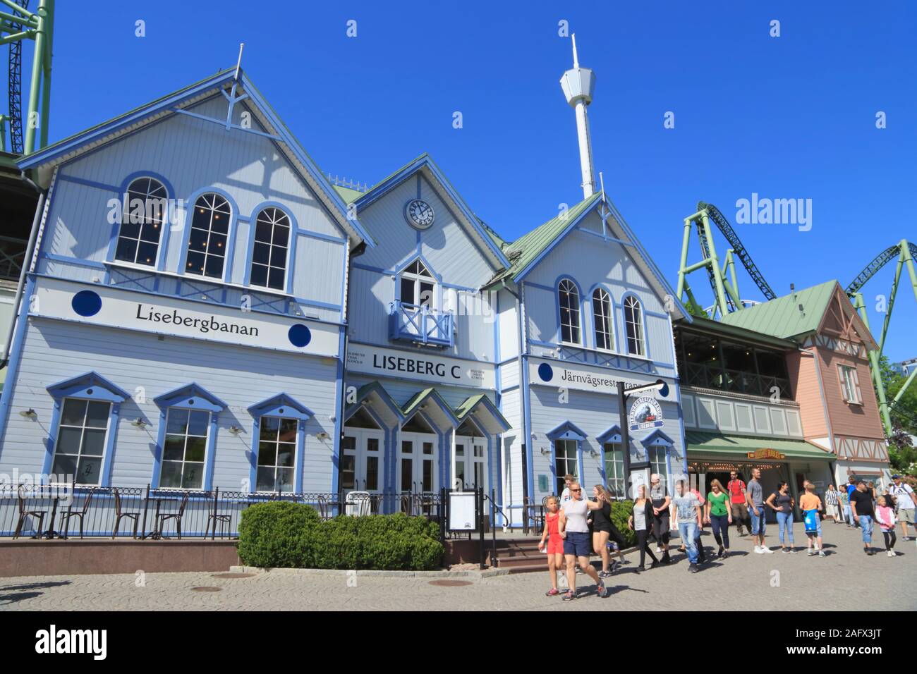 People walk past the station building in Liseberg in Gothenburg city ...