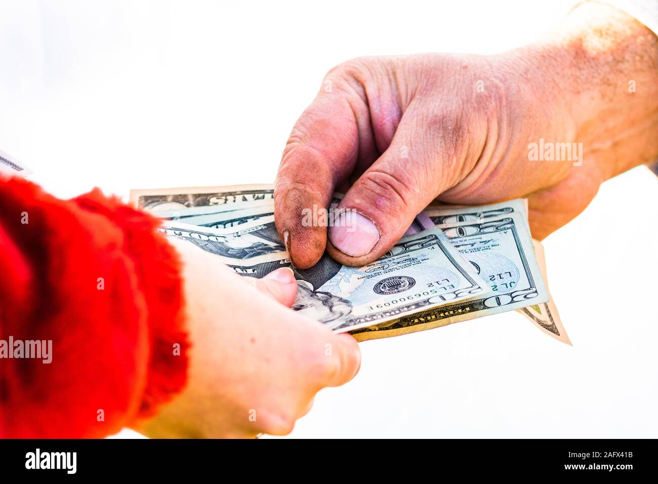 Hand giving money isolated, hard worked hand taking dollars money ...