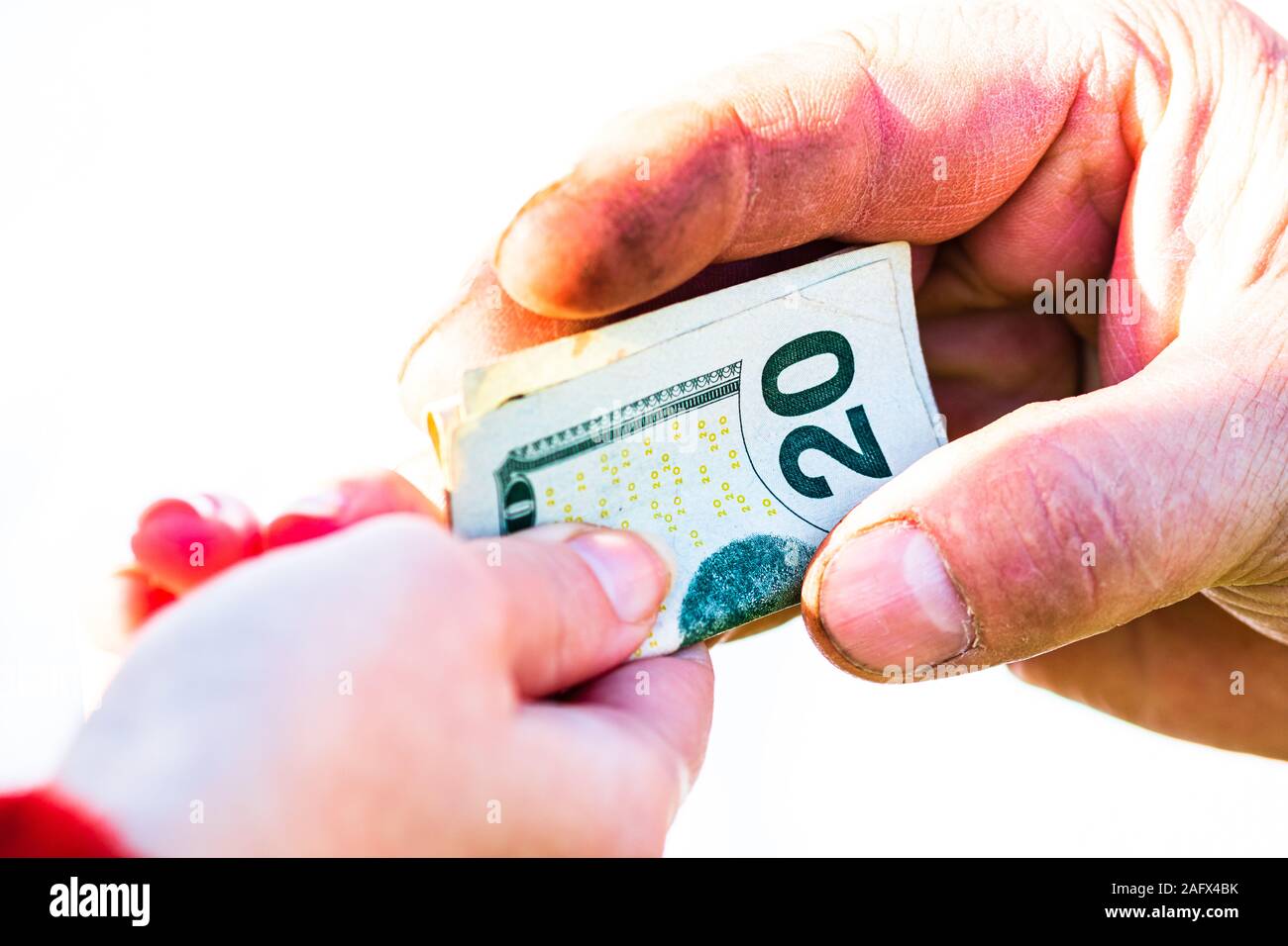 Hand giving money isolated, hard worked hand taking dollars money ...