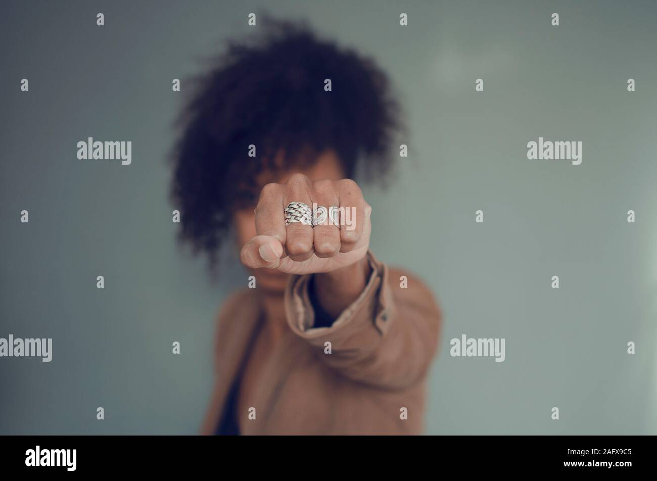Young black business woman fist hi-res stock photography and images - Alamy