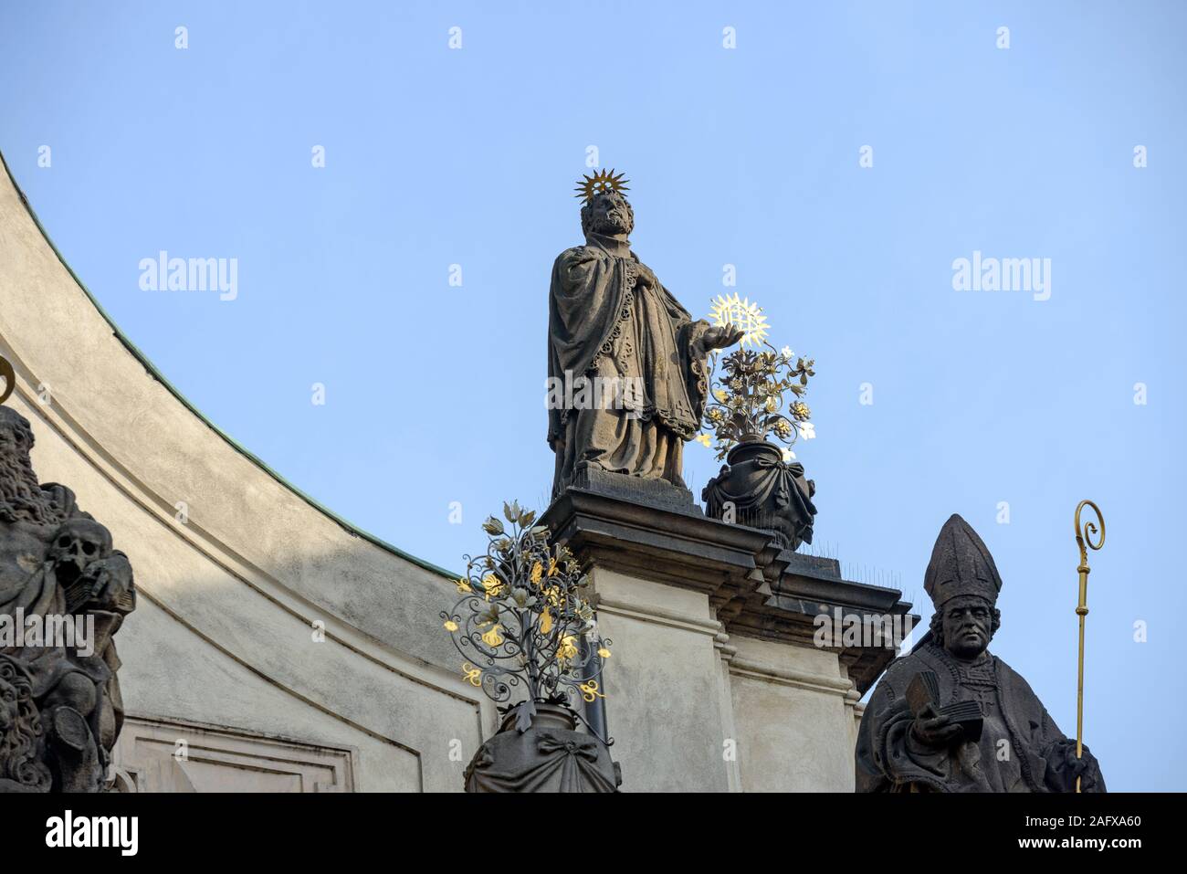 Old medieval sandstone sculpture of apostle of Christ above right part ...