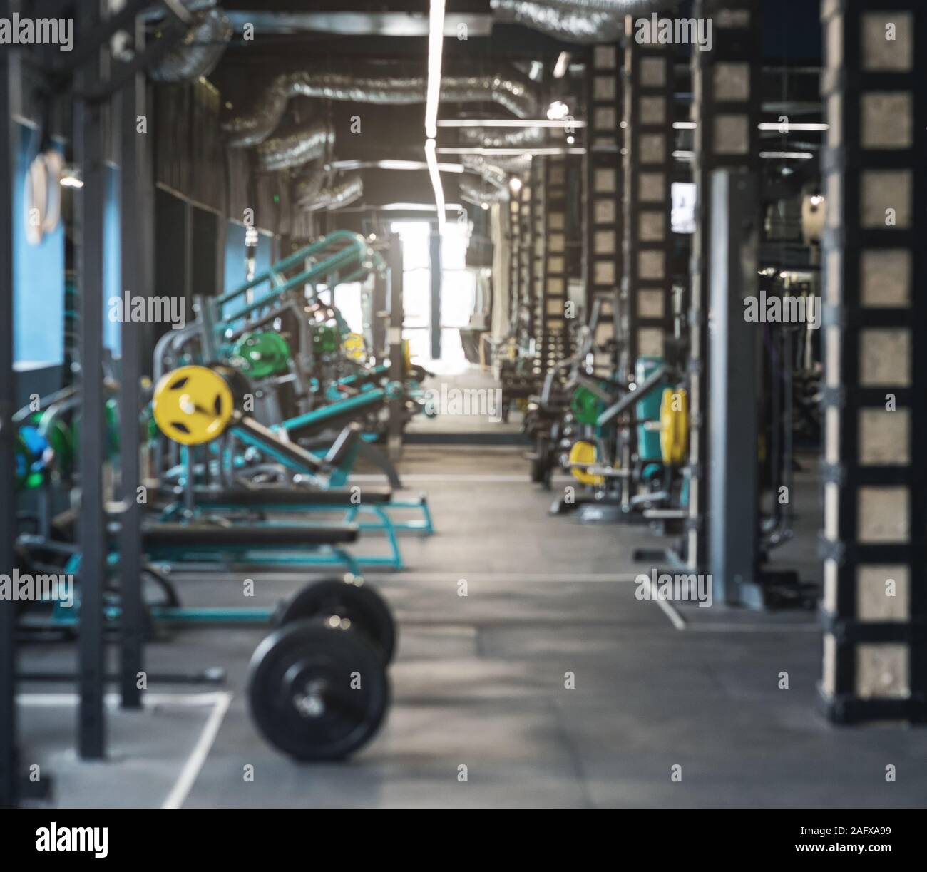 Interior of modern gym with various equipment for trainings Stock Photo ...