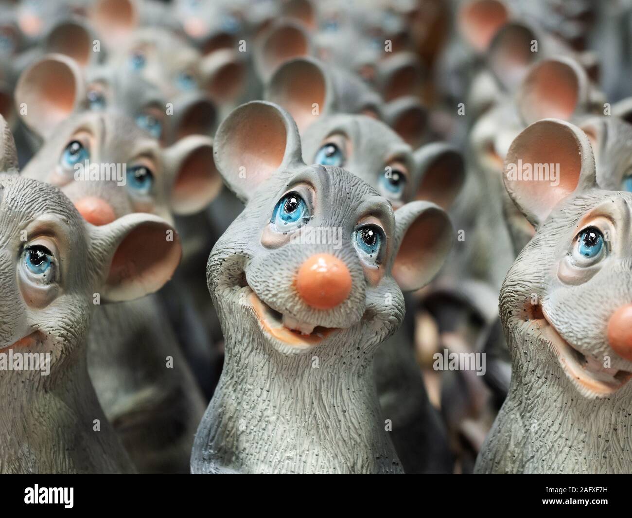 Gray ceramic mouse smiling on front view. Symbol 2020 Stock Photo - Alamy
