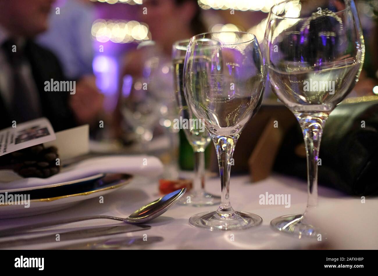 Evening event with wine glasses on the tables Stock Photo - Alamy