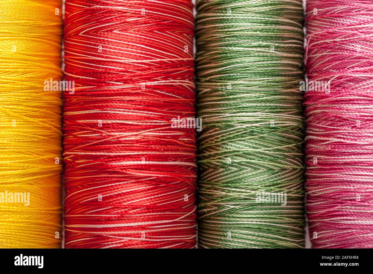 Yarn reels color full texture Stock Photo - Alamy