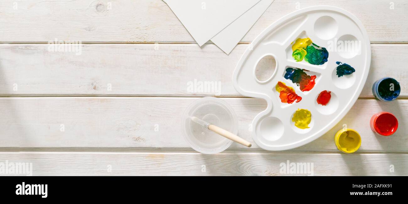 Art concept - colour wheel, gouache paints, brush and palette Stock ...