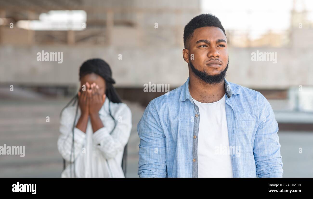 Boyfriend leaving girlfriend after quarrel outdoors, depressed woman ...