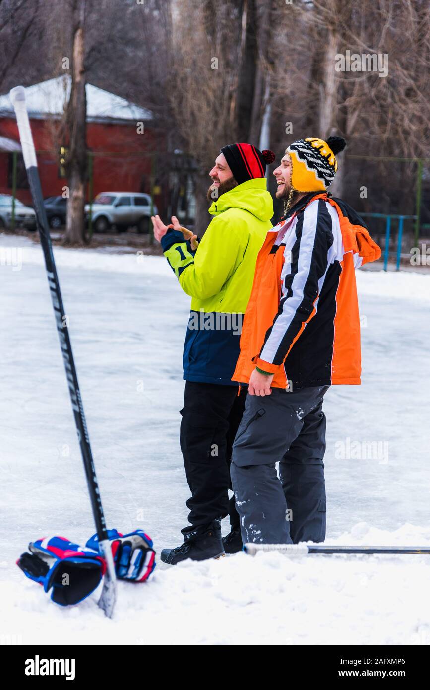the guys at the rink watching the match Stock Photo - Alamy